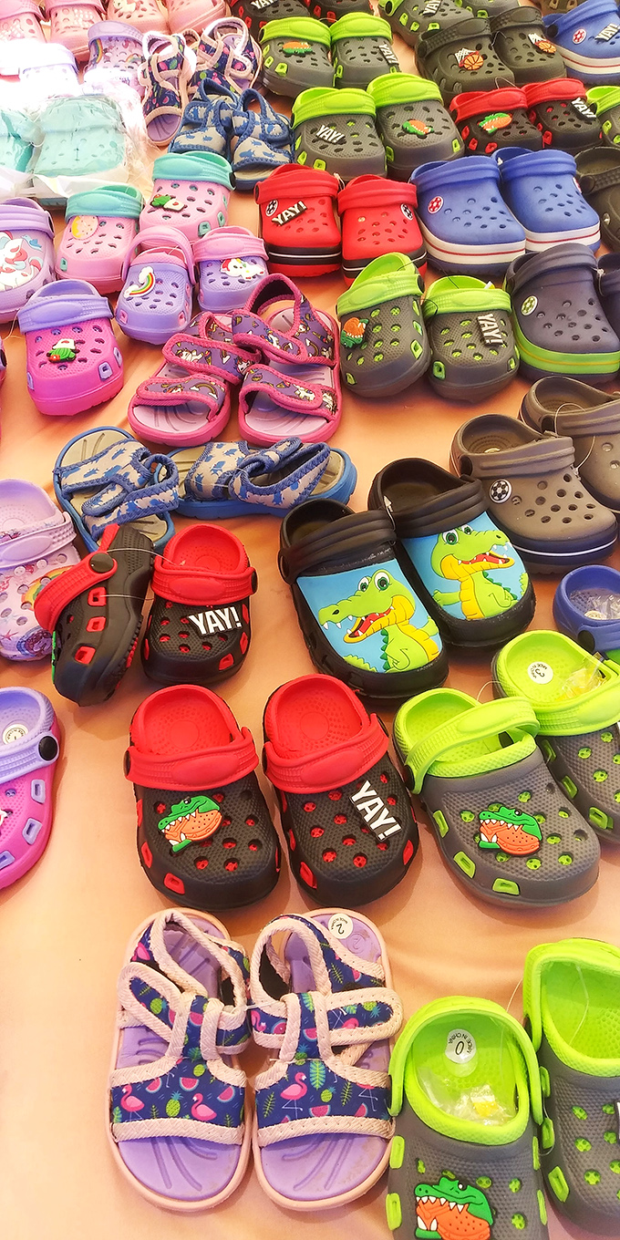 Croc nation in full display! From alligator-adorned kids' sizes to practical adult versions, comfort has never been so colorful or affordable.