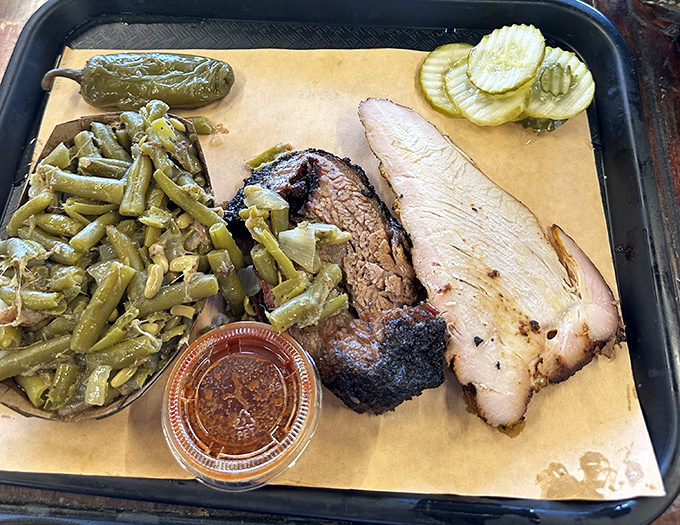 Turkey and brisket with green beans that have clearly been fraternizing with pork. Vegetables are always better with a meat chaperone.