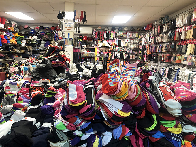 The sock and cap emporium—where "just one pair" becomes a shopping bag full. More colors than a rainbow convention and enough styles to outfit a small nation.