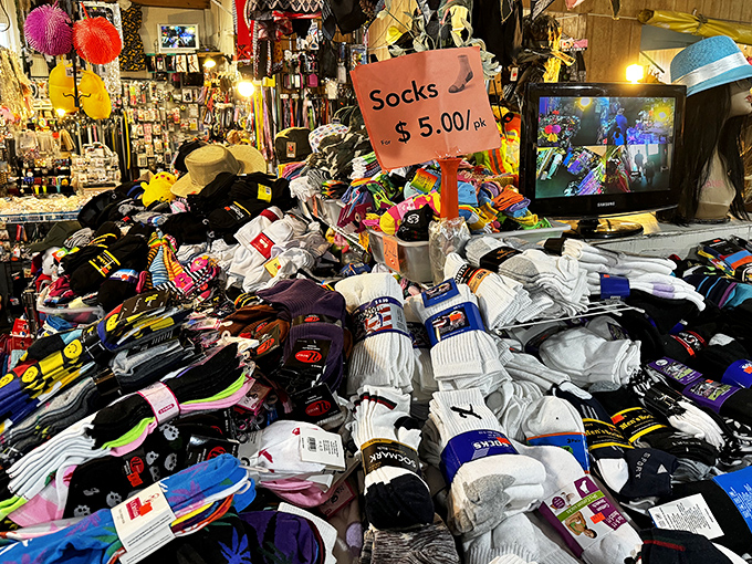 Mountains of socks prove that even the most mundane necessities can become adventures in bulk purchasing psychology.