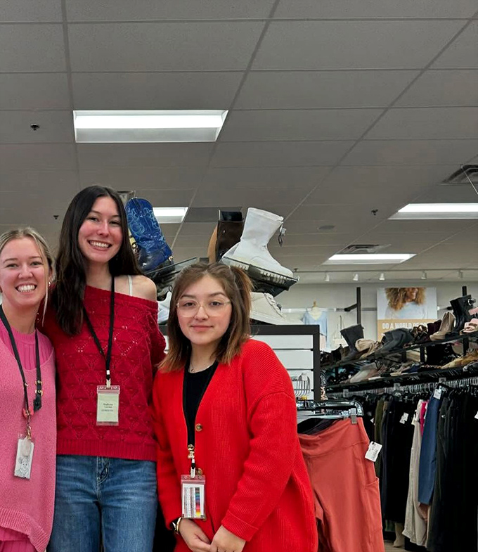The friendly faces behind the fashion finds. These helpful staff members turn secondhand shopping from a chore into a cheerful treasure hunt.