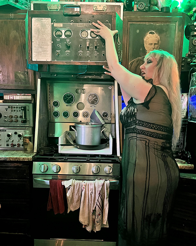 The tour guide enthusiastically demonstrates vintage equipment, bringing the strange contraptions to life with theatrical flair.