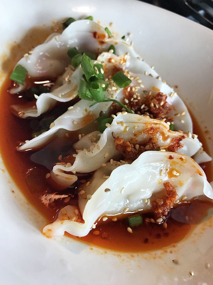 These aren't just dumplings&mdash;they're little pillows of joy bathing in a sauce so good you'll want to bottle it.