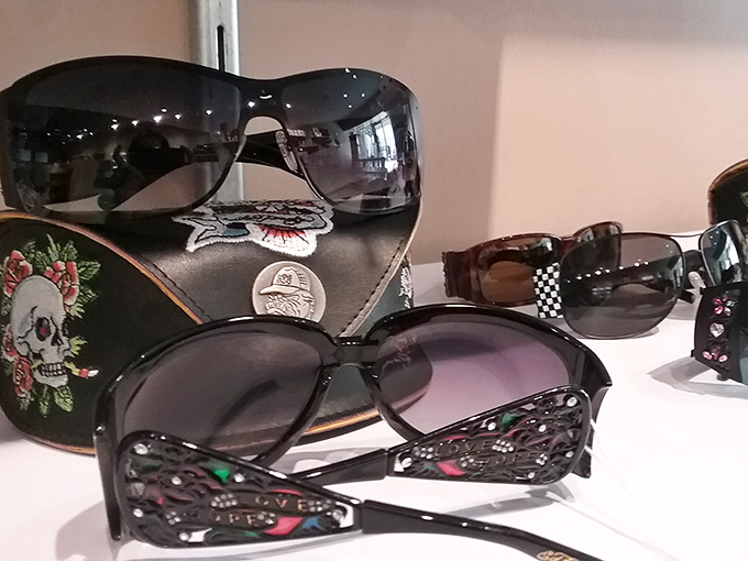 Sunglasses with attitude and artistry. That skull-adorned case isn't just storage—it's a statement piece that says "my eyewear has personality."