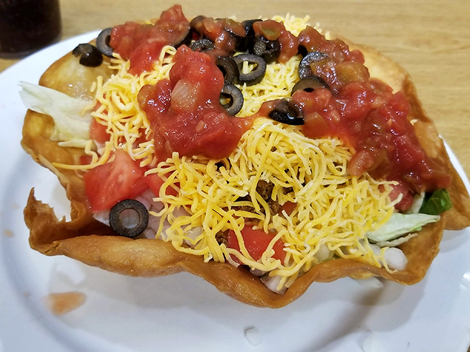 A taco salad that defies gravity and good sense &ndash; a crispy tortilla bowl filled with enough toppings to feed a small family.