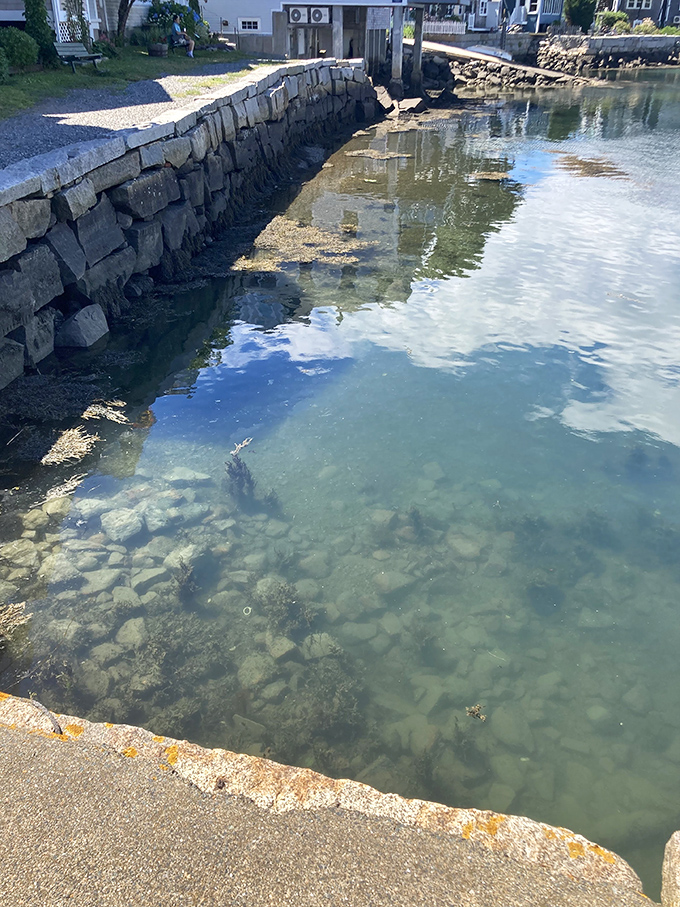 Crystal clear waters reveal Rockport's granite foundations, a reminder that beauty here runs deeper than what meets the eye.