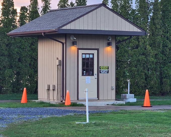 The humble ticketing booth serves as your gateway to America's oldest continuously operating drive-in theater experience.