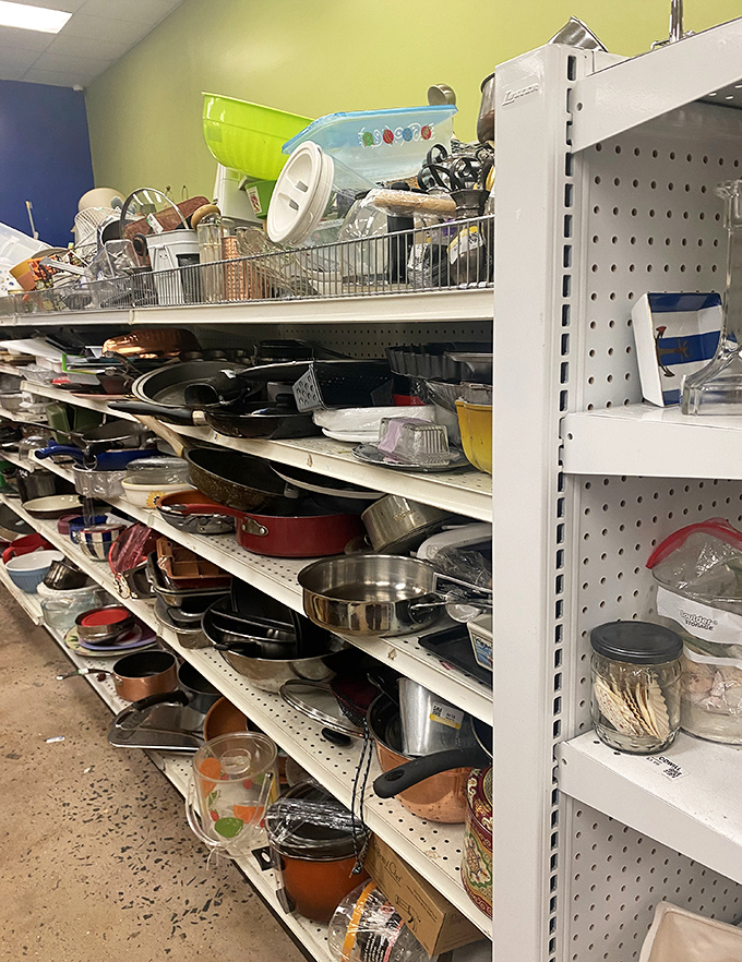 Kitchen treasures stacked like an archaeological dig through American culinary history&mdash;Pyrex patterns your grandmother would recognize.