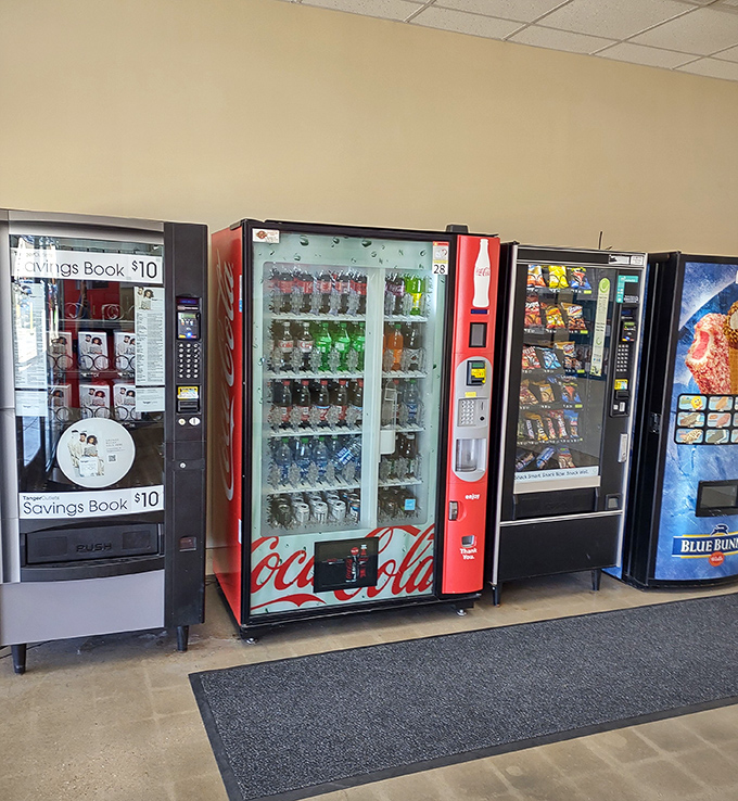 Vending machines: the unsung heroes of marathon shopping expeditions. When bargain hunting depletes your energy, these faithful servants stand ready with liquid reinforcements.