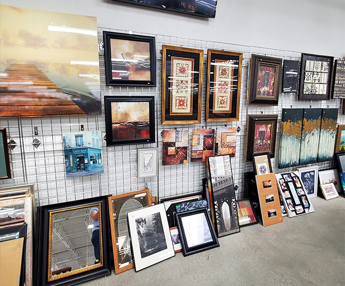 The wall art section: where someone's former living room centerpiece waits to find new appreciation on your blank wall space. 