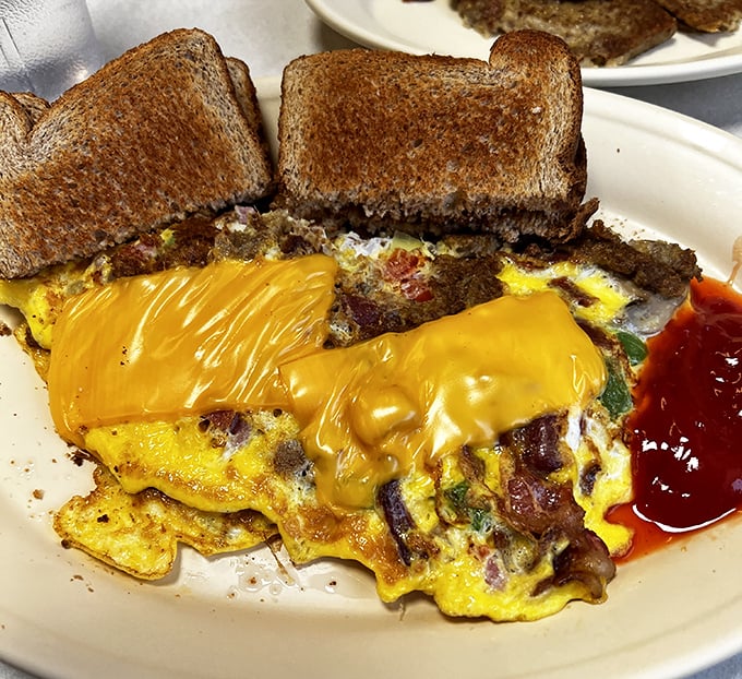 This Western omelet with melted cheese and toast isn't just breakfast&mdash;it's edible therapy. The kind that makes Monday mornings bearable. 