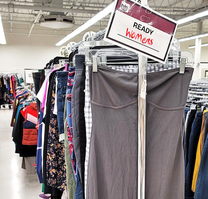 The women's clothing section is meticulously organized—no archaeological expedition required to find your size in these carefully curated racks.
