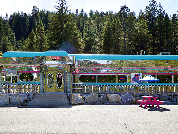 The 59er Diner's chrome exterior shines like a mirage among the evergreens&mdash;a retro oasis serving shake perfection in the wilderness.