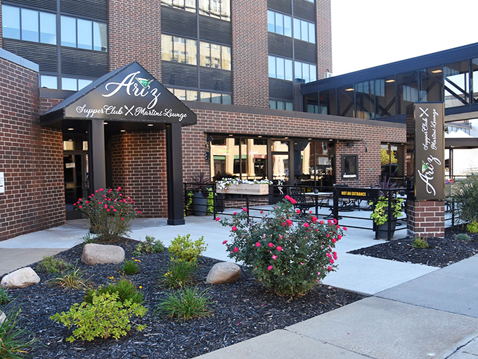 Ari'z modern brick facade brings a touch of metropolitan flair to Iowa's supper club scene.