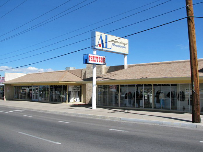 The Assistance League storefront promises organized treasures inside. No chaotic digging required at this community-minded shop!