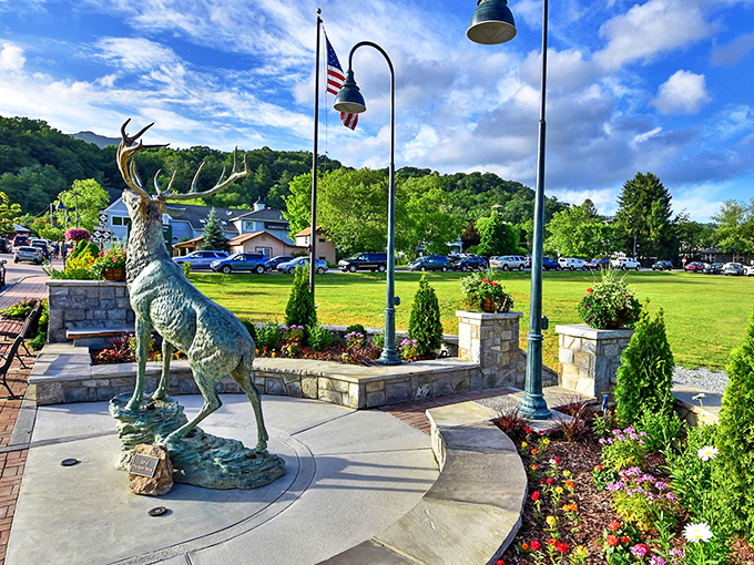 Banner Elk's proud elk statue stands sentinel over the town square, greeting visitors with metallic majesty and floral flair.