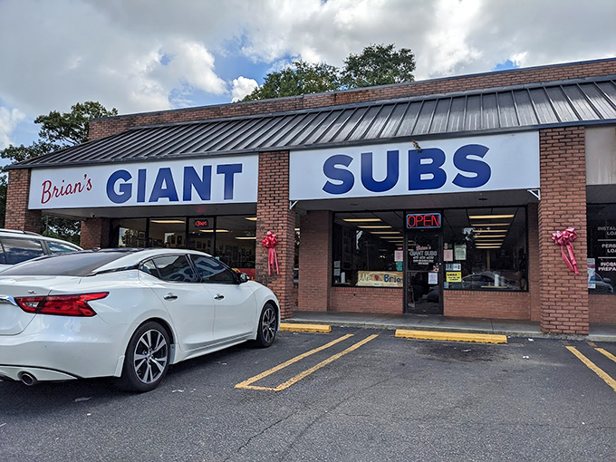 Brian's Giant Subs doesn't need fancy decor when the sandwiches speak for themselves. That "ORDER HERE" sign points the way to happiness.