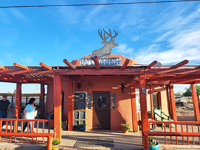 Rustic pergola and southwestern charm create the perfect setting for burgers worthy of hungry Old West cowboys.
