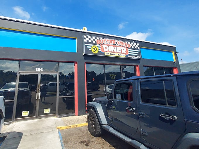 Butter Krisp's racing-inspired exterior promises food that moves fast from kitchen to table. Their checkered flag signals victory for your taste buds.