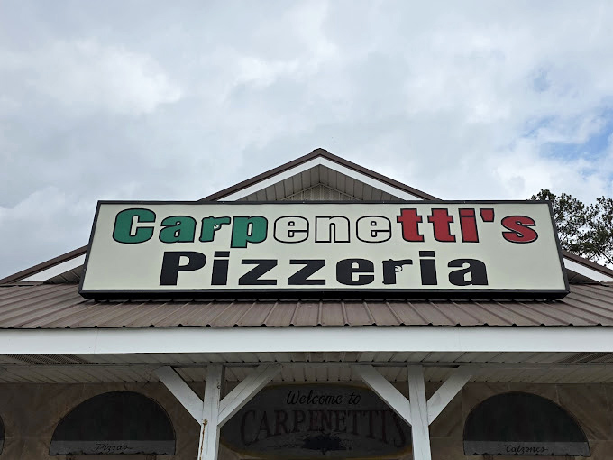 Rustic charm meets serious pizza craft in this mountain cabin-inspired pizza paradise.