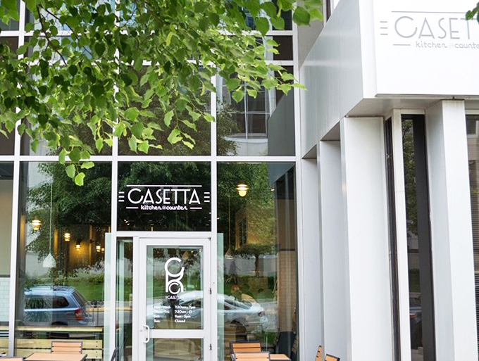 Modern glass and clean lines promise elevated comfort food for the contemporary palate, invitingly presented.