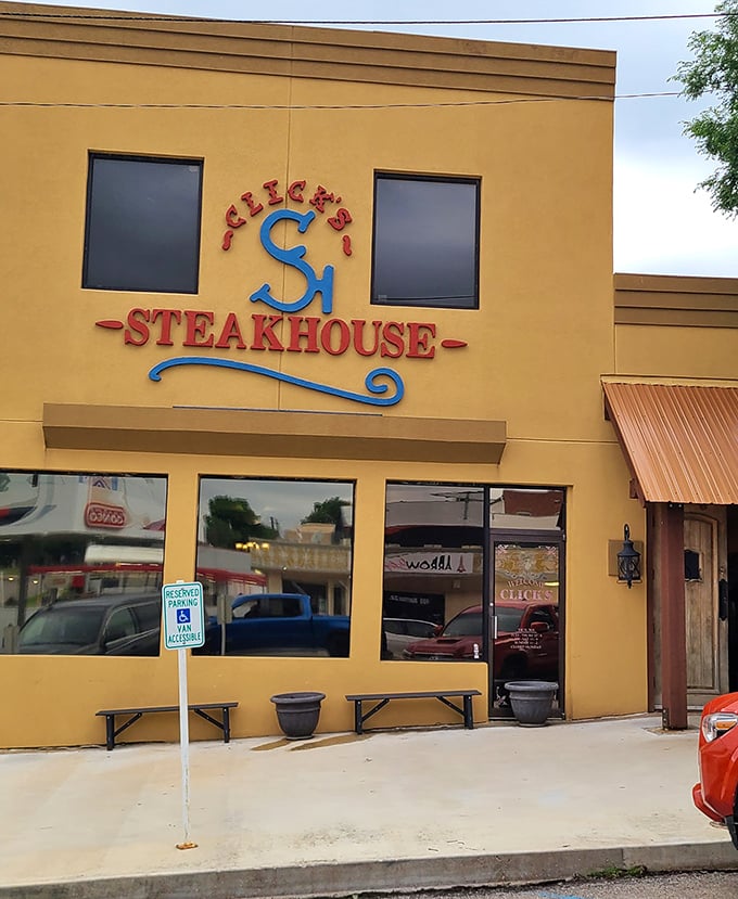 Click's sunny yellow facade brightens up Pawnee like a beacon for steak lovers seeking small-town perfection.