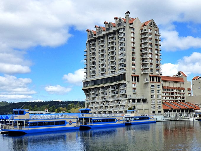 The Coeur d'Alene Resort stands tall above the lake like a fancy wedding cake that somehow landed in paradise.