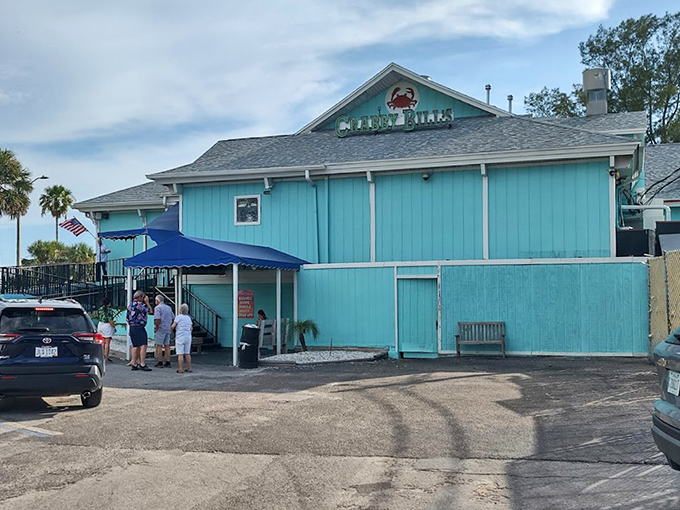 Bright turquoise walls announce serious beach dining intentions at this Gulf Coast seafood institution.