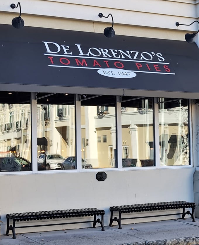 De Lorenzo's elegant storefront promises sophisticated simplicity. Their tomato pies have elevated this humble dish to an art form.
