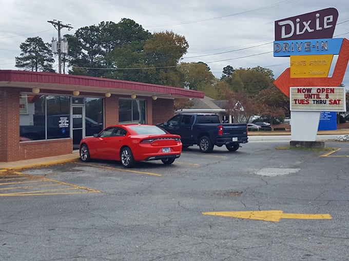 Dixie Drive-In's retro brick facade has witnessed decades of first dates, family dinners, and burger-induced happiness.