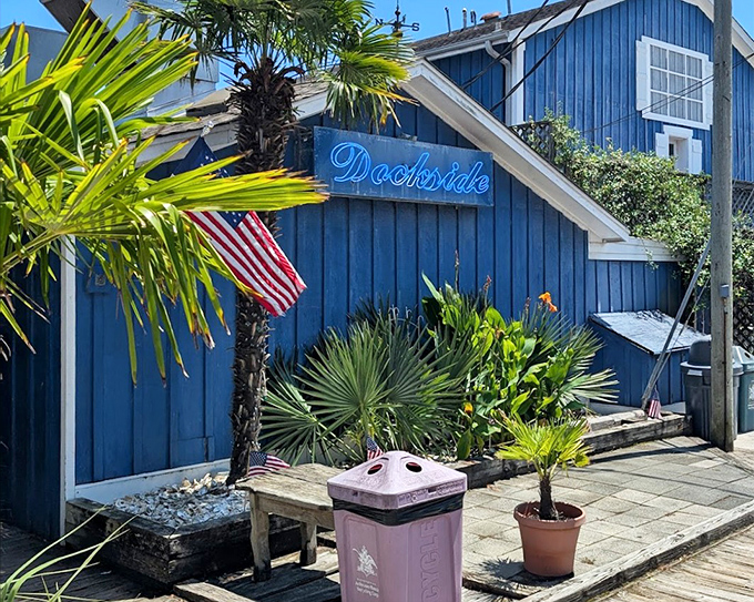 Dockside's brilliant blue exterior matches the water it sits beside &ndash; a colorful promise of seafood with a view.