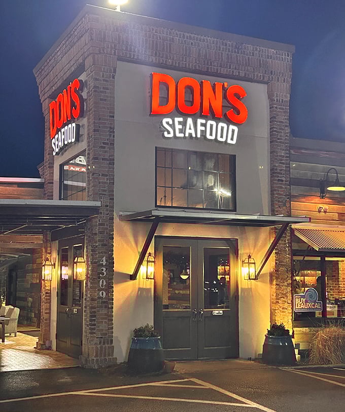 Don's glowing brick facade welcomes hungry travelers. Where Cajun seafood dreams come true after sunset.