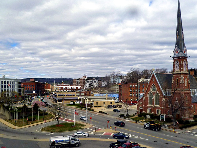 Fitchburg's church spire points skyward while the city spreads out in hopeful directions.