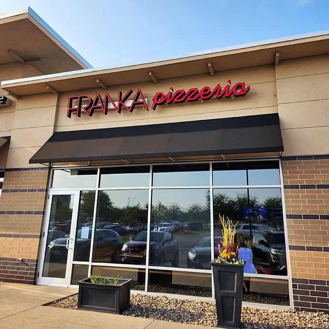 Franka's sleek, modern storefront brings contemporary style to pizza traditions. Clean lines outside, creative pies inside.