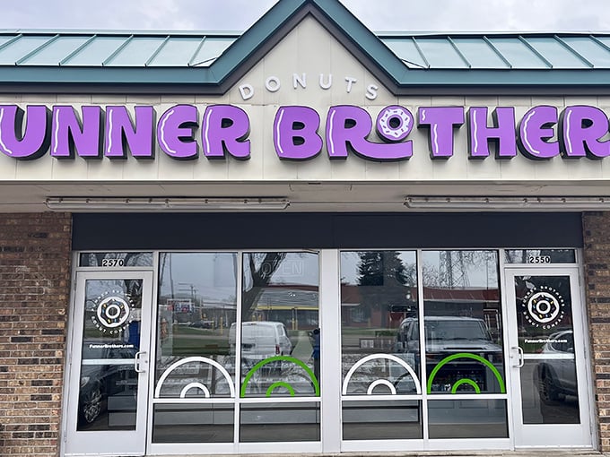 Funner Brothers lives up to its playful name with that eye-catching purple sign. These donuts aren't just breakfast&mdash;they're the life of the party!