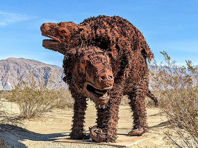Metal dinosaurs patrol the desert landscape at Galleta Meadows, where art and nature create an otherworldly experience.