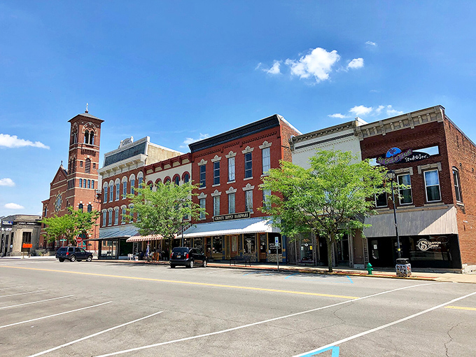 Greensburg's storefronts shine under blue skies, offering small-town affordability that would make your financial advisor smile.