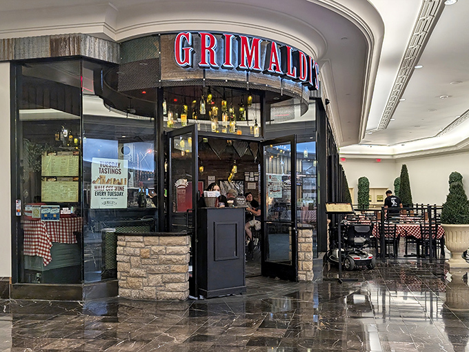 The elegant entrance promises a pizza experience that's dressed to impress but priced to please.
