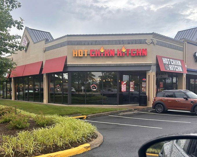 HCK's modern storefront with flames in the logo &ndash; a warning and a promise all in one glorious sign.