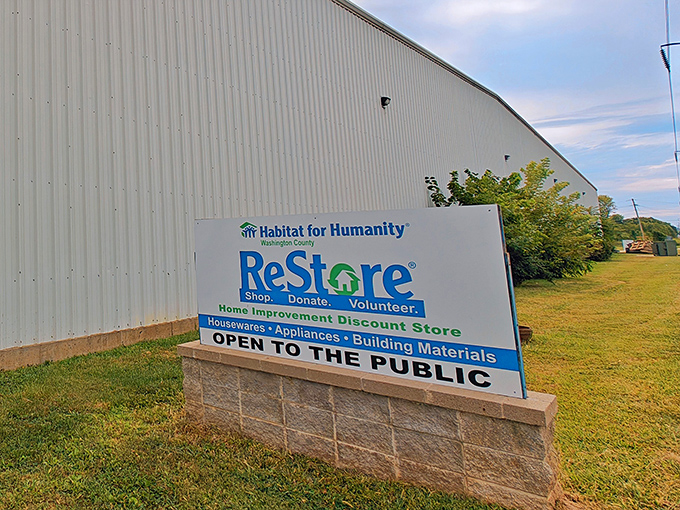 Habitat ReStore's warehouse exterior hints at the home improvement goldmine waiting inside for DIY enthusiasts.