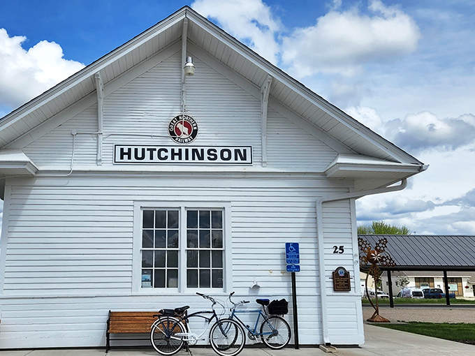 The old train depot stands as a testament to simpler times when travel was adventure, not financial hardship.