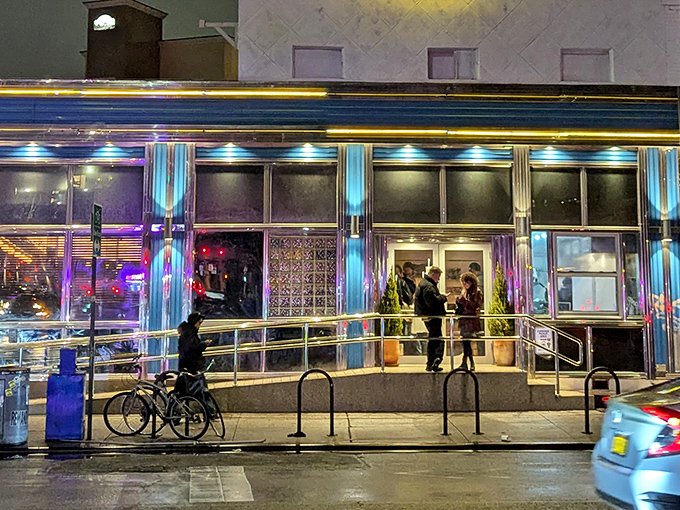 Kellogg's Diner glows like a breakfast lighthouse, guiding hungry souls to their morning salvation below.