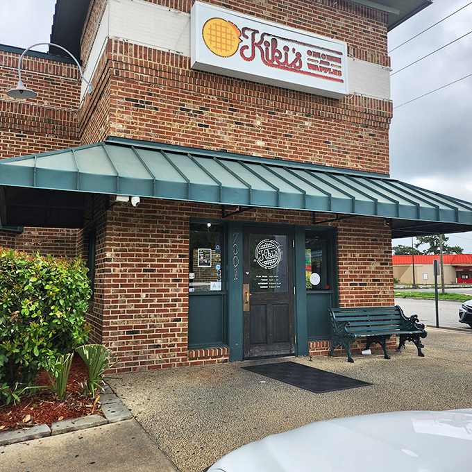 Behind that brick exterior and green awning awaits the magical pairing of crispy chicken and fluffy waffles.
