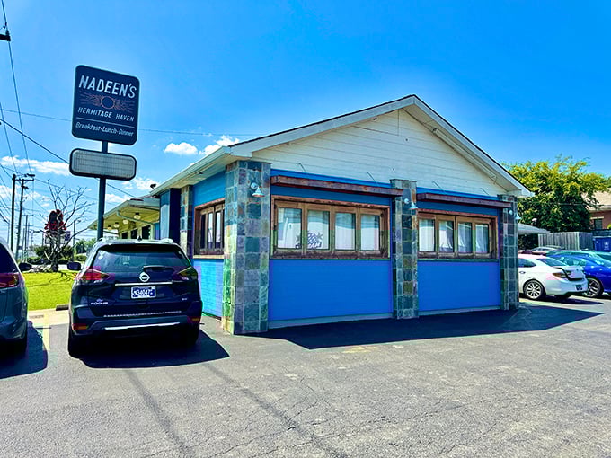 Nadeen's bright blue exterior stands out against the Tennessee sky, promising home-cooked goodness inside this Hermitage haven.