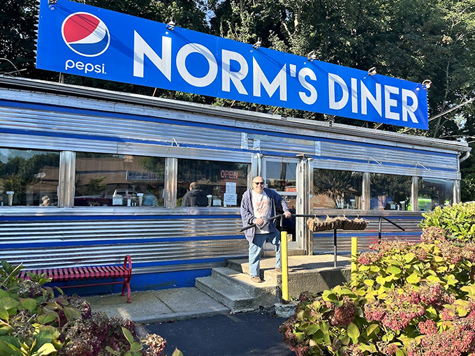 Blue chrome gleaming in the sunshine makes Norm's look like a vintage postcard come alive.
