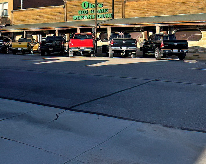 Classic small-town steakhouse vibes where the parking lot tells the story of satisfied customers.