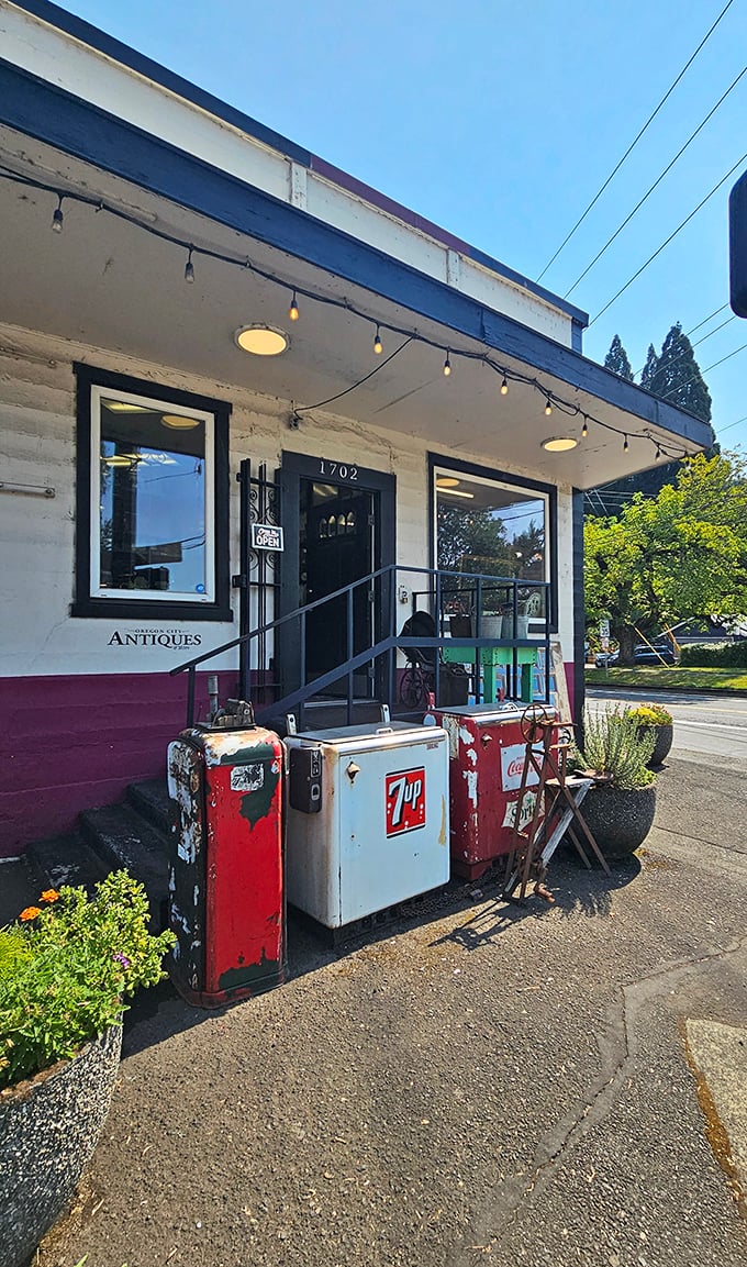 Those vintage coolers out front are like breadcrumbs leading to the real treasure trove inside.