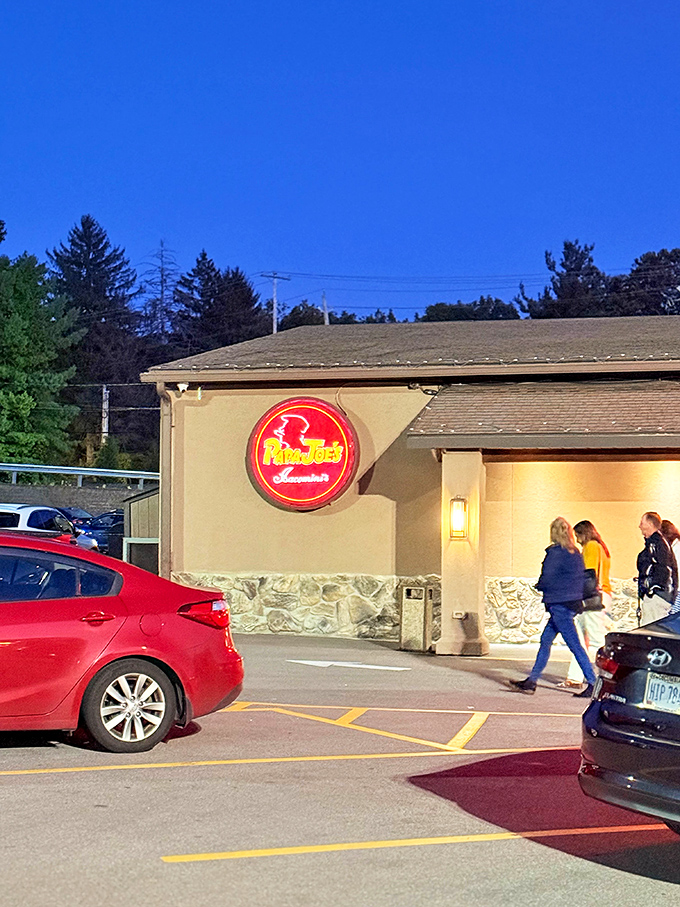 Papa Joe's glowing sign beckons hungry travelers like a lighthouse guiding ships to safe, delicious harbor.