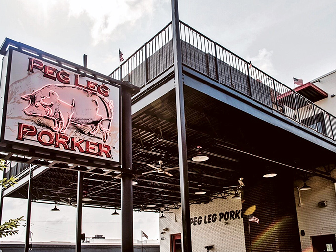 Modern lines meet old-school smoking at Peg Leg Porker – where rooftop dining meets basement-level flavor intensity.