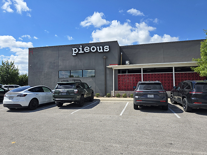 Pieous embraces industrial chic with its concrete exterior. Inside this Austin bunker, sourdough pizza dreams come true.